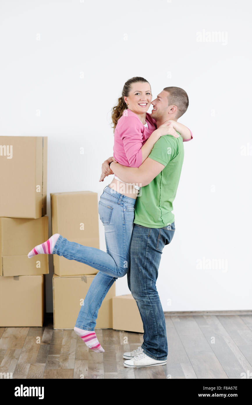 happy Young couple moving in new home Stock Photo - Alamy