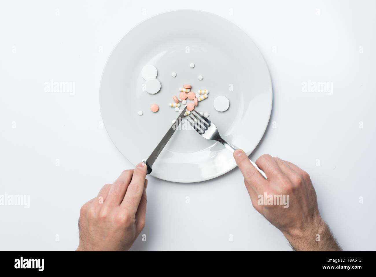 Eating pills hi-res stock photography and images - Alamy