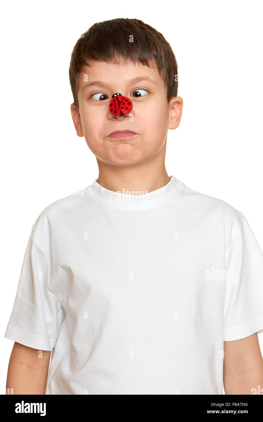boy with ladybug look on nose and make faces, teenager fun portrait ...