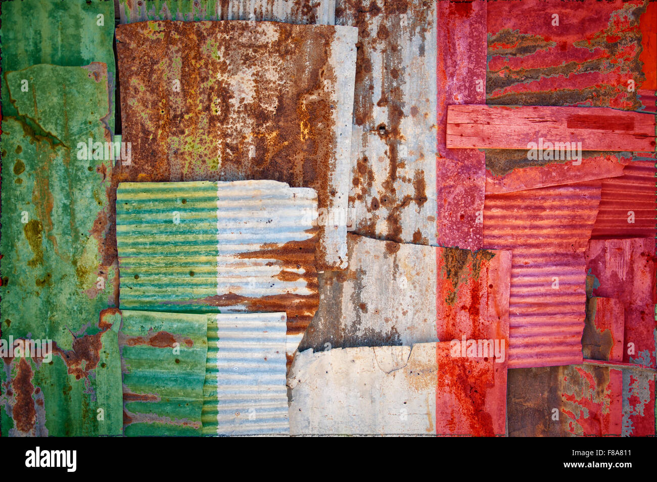 An abstract background image of the flag of Italy painted on to rusty ...
