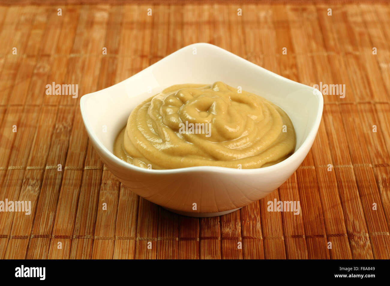 Mustard in bowl Stock Photo - Alamy
