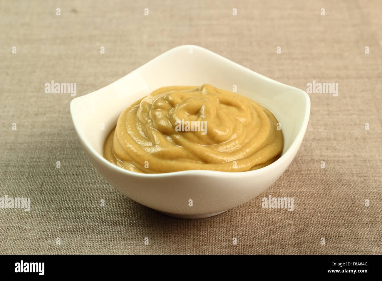 Mustard in bowl Stock Photo - Alamy