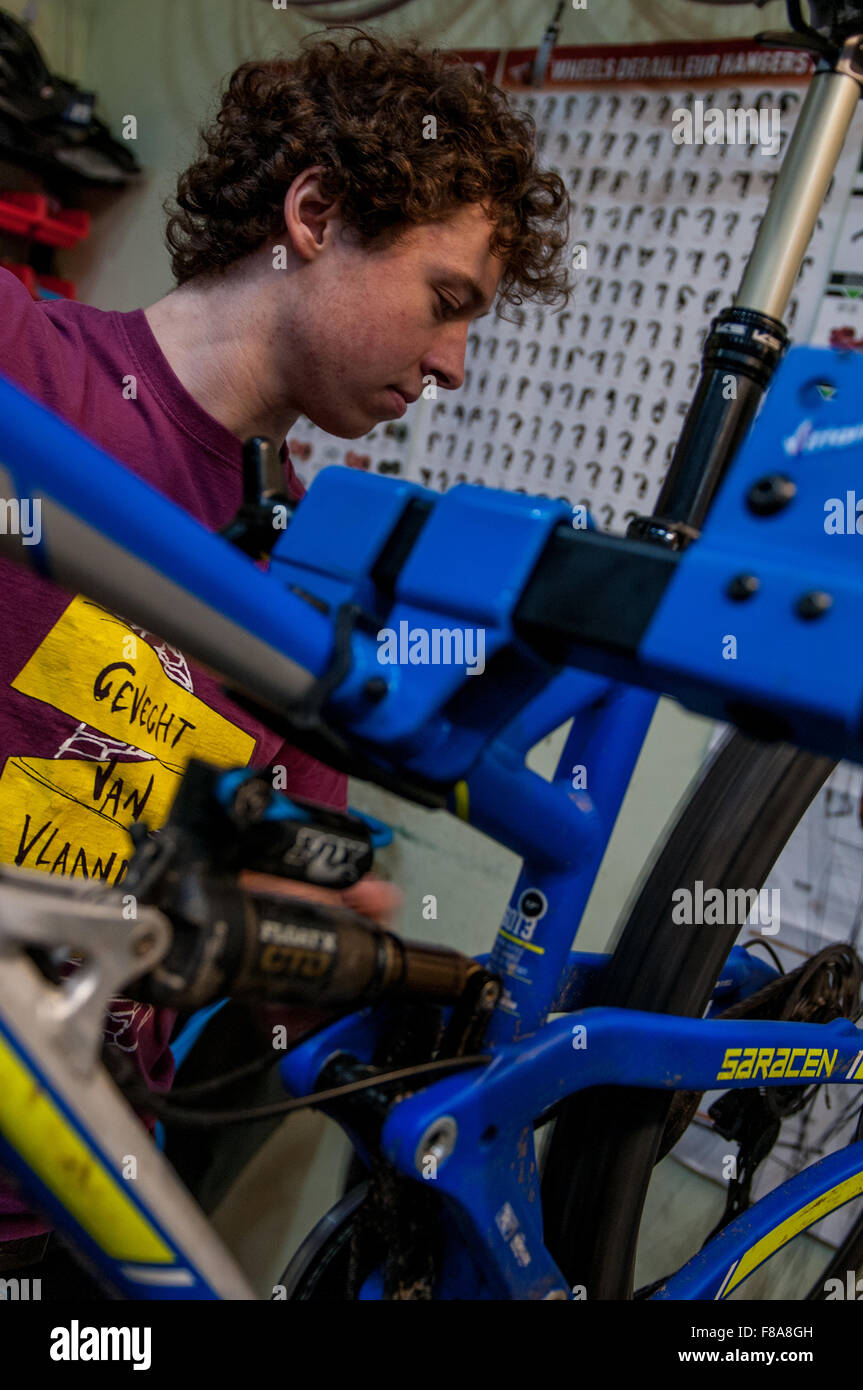 Cardiff, United Kingdom, 30th November. Dan Powell works on his bike in ...