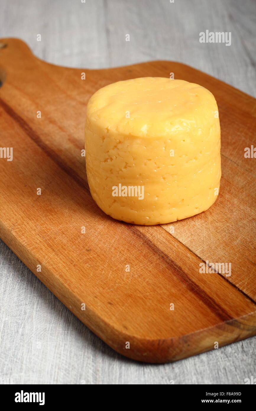 Slab of cheese Stock Photo - Alamy