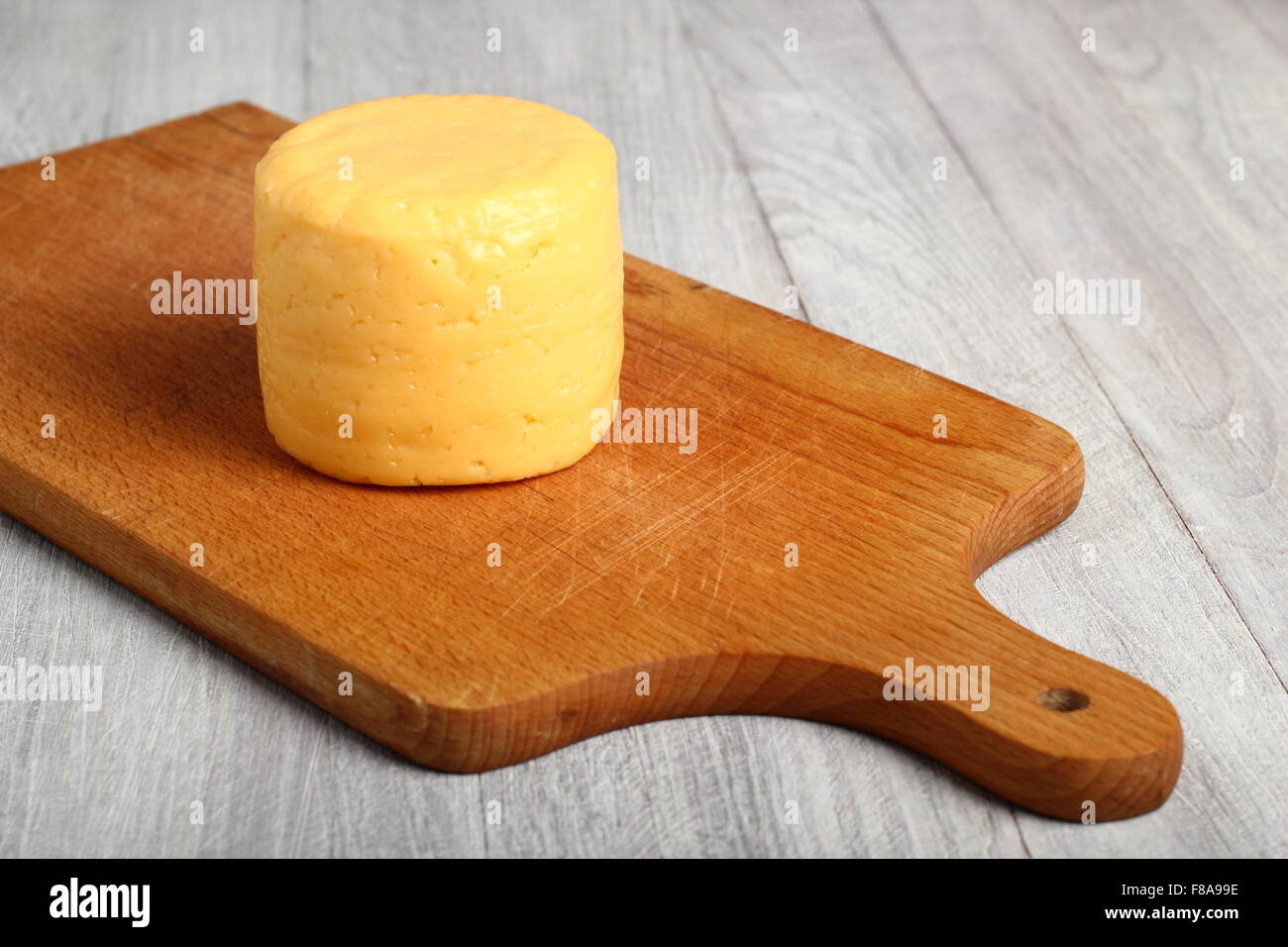 Slab of cheese Stock Photo - Alamy