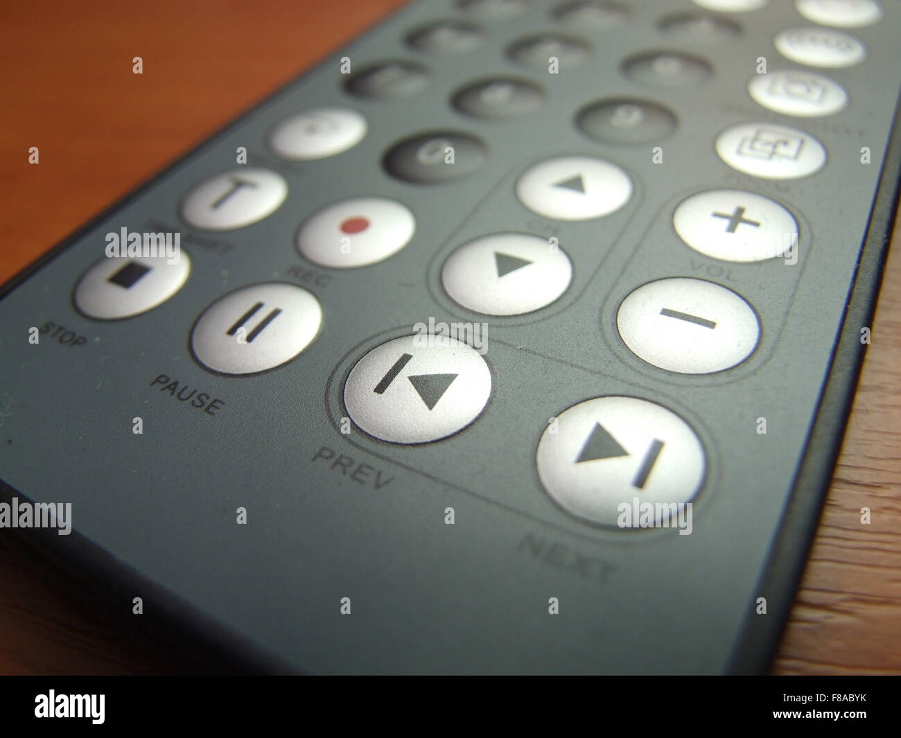 Wooden surface tv remote hi-res stock photography and images - Alamy