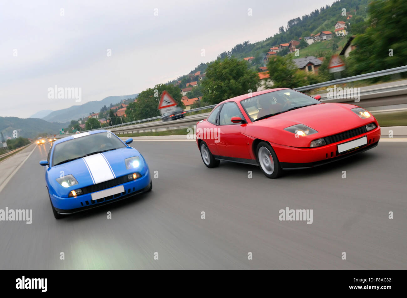 Two racing cars drive hi-res stock photography and images - Alamy