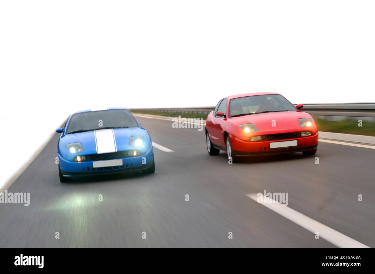 Picture of solated tuning cars speed racing on highway captured with ...