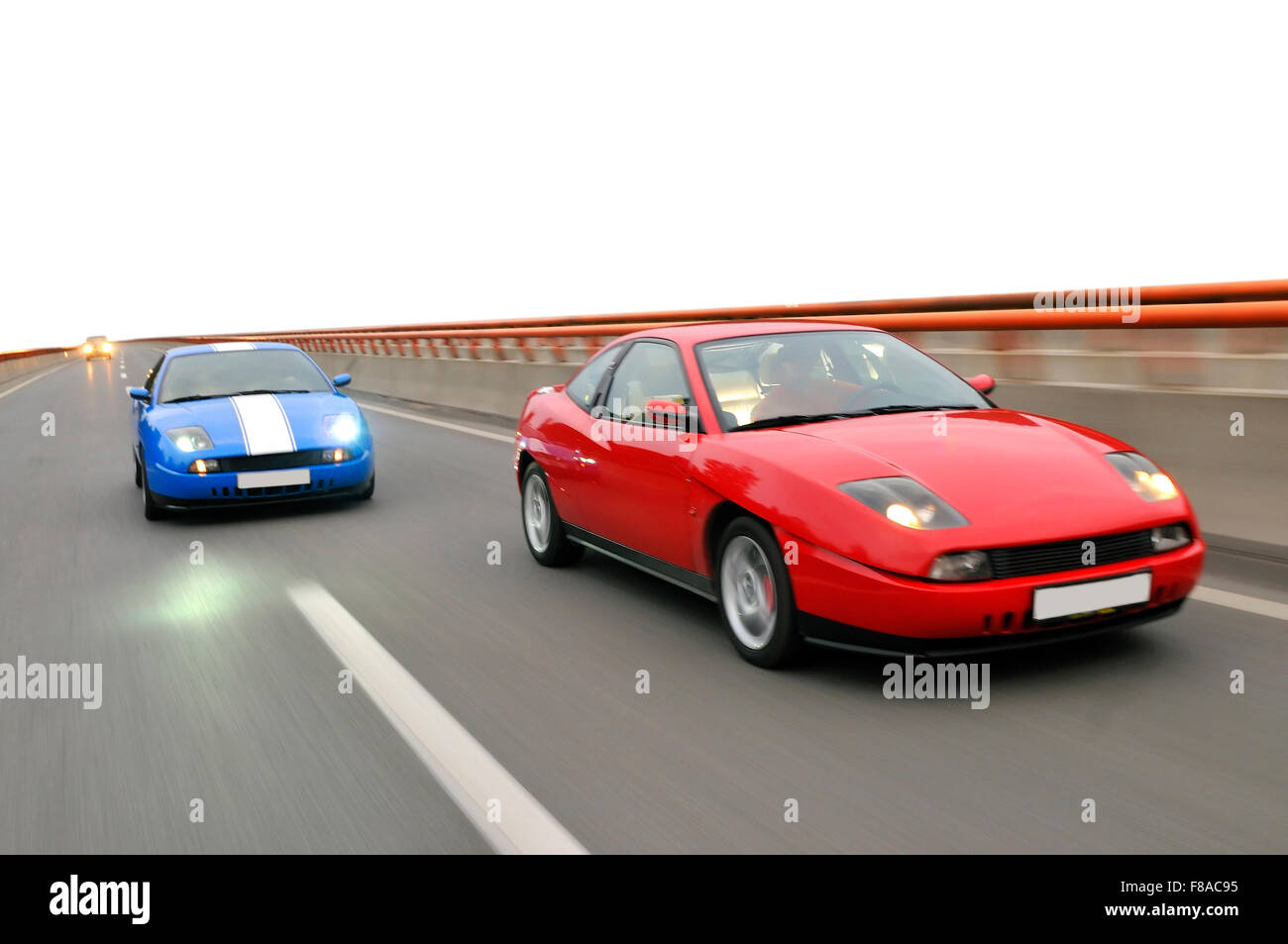 Two hot tuning cars racing Stock Photo - Alamy