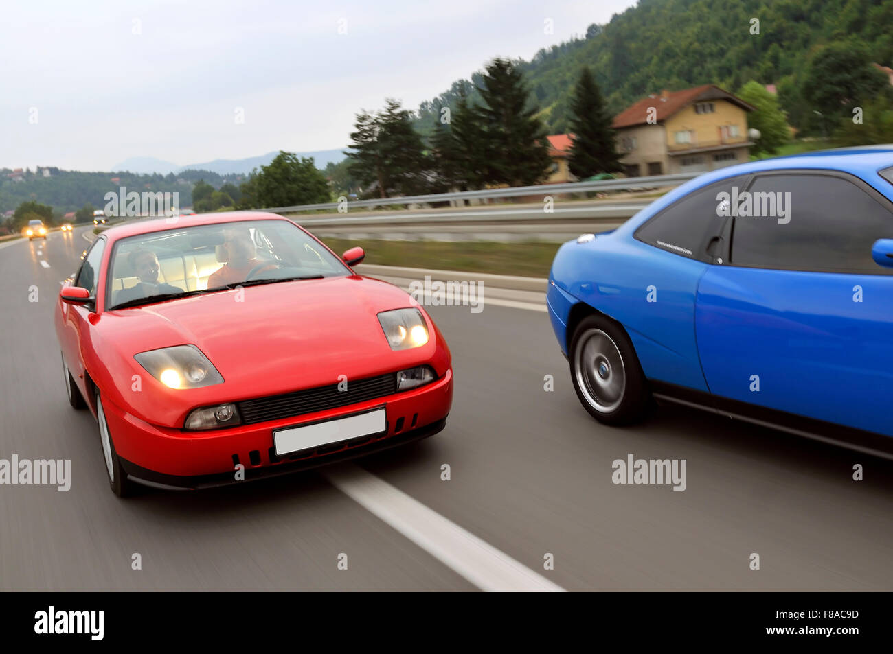 Two hot tuning cars racing Stock Photo - Alamy