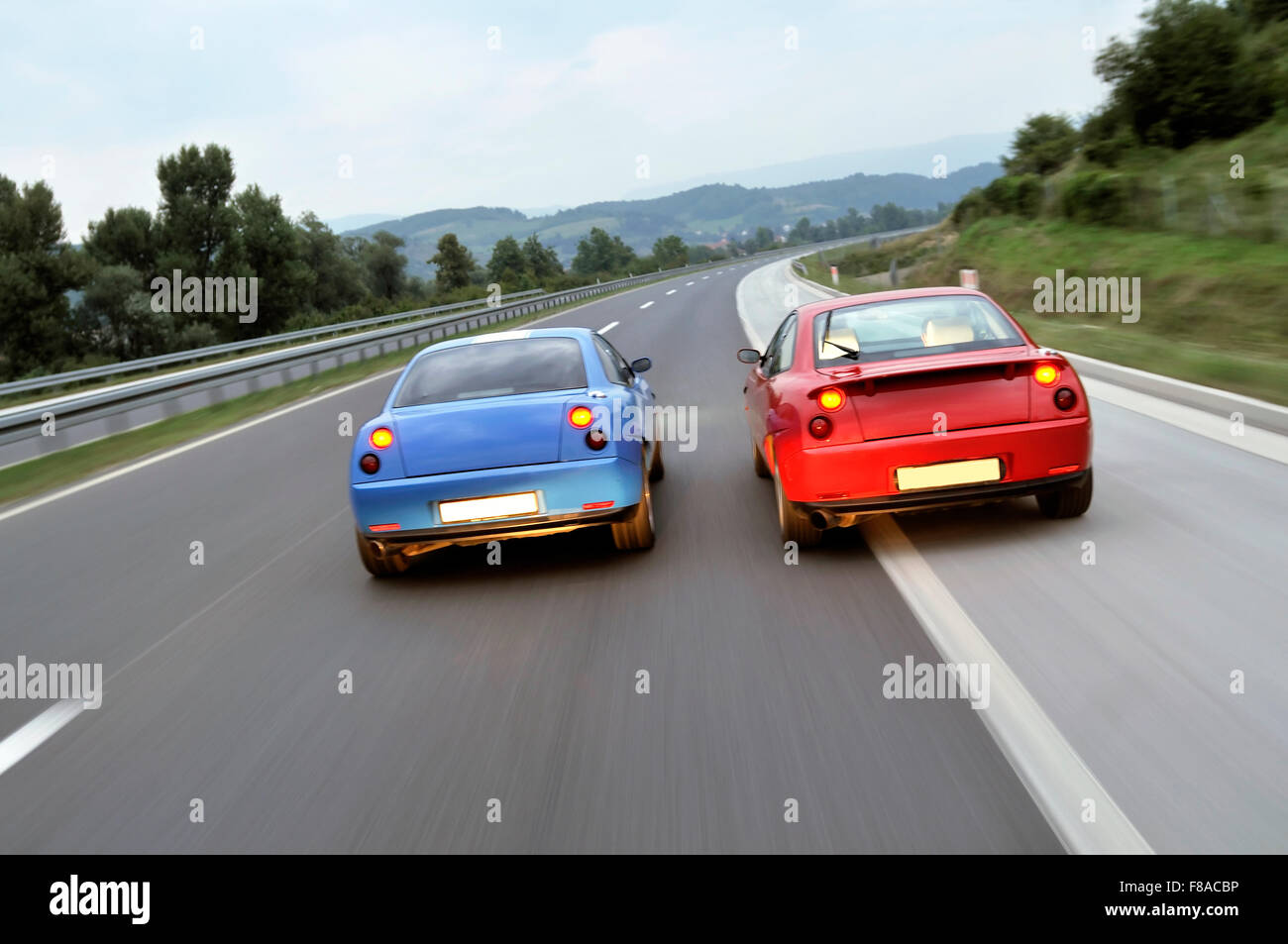 Two hot tuning cars racing Stock Photo - Alamy