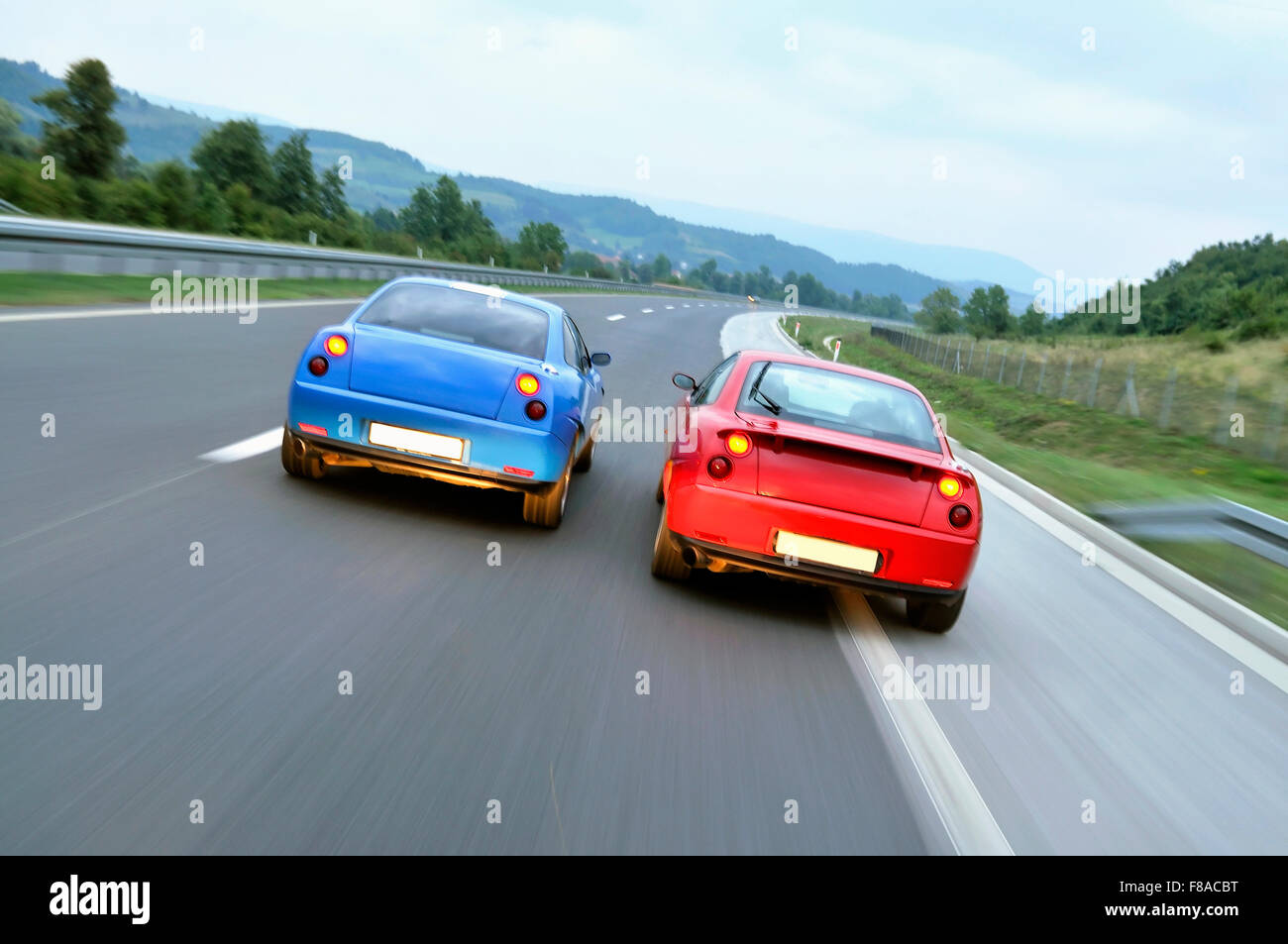 Two hot tuning cars racing Stock Photo - Alamy