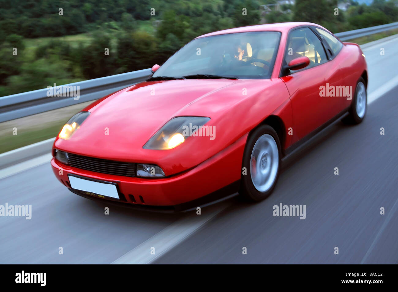 Picutre of tuning cars speeding on highway captured with long exposure ...