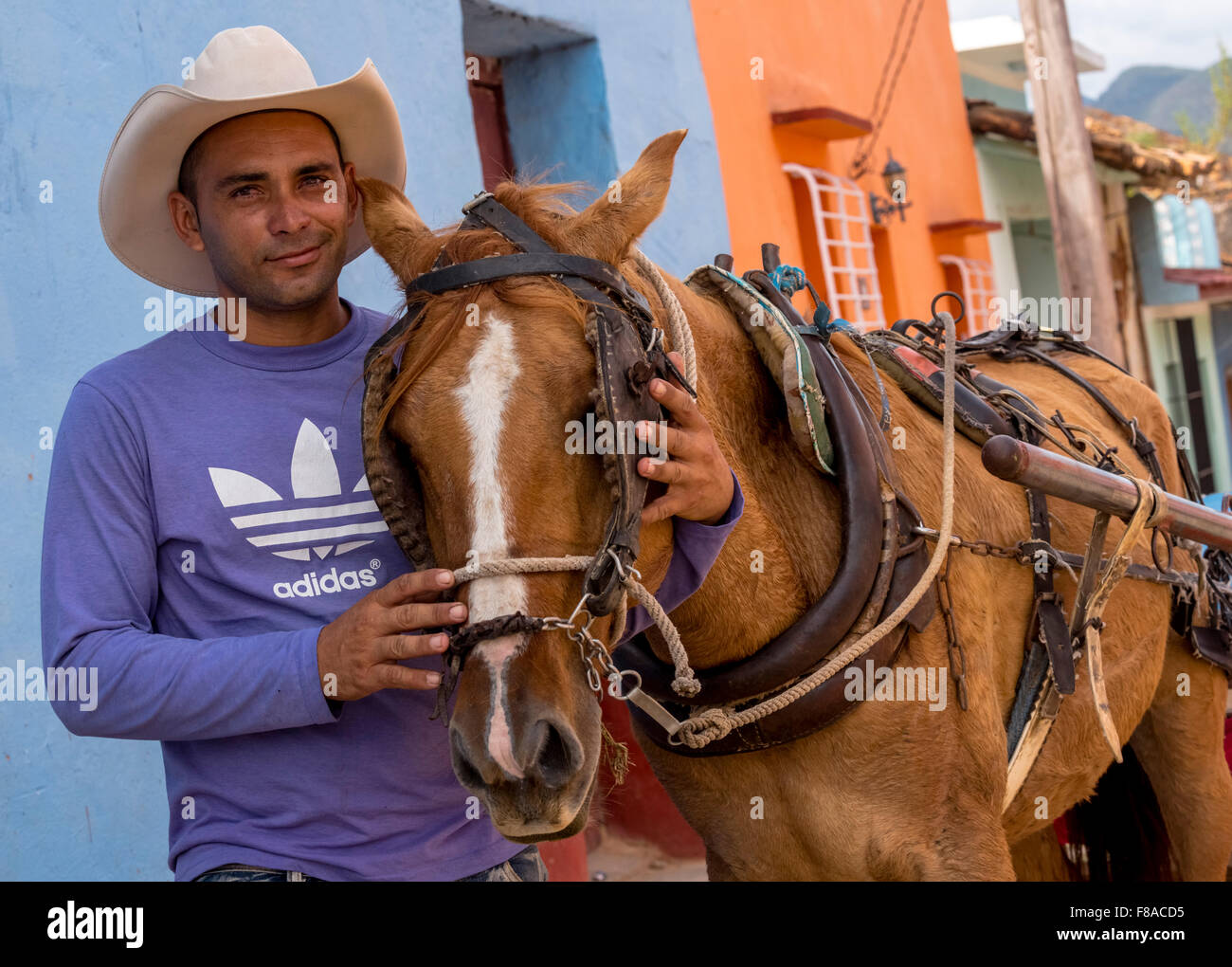 Cuban rider cowboy with his horse in the streets of Trinidad, Street ...