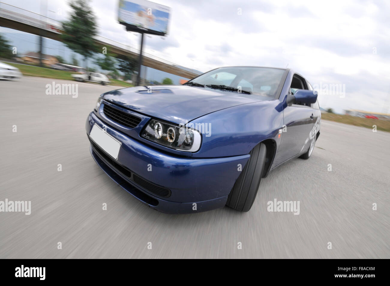 Fast car moving with motion blur Stock Photo - Alamy