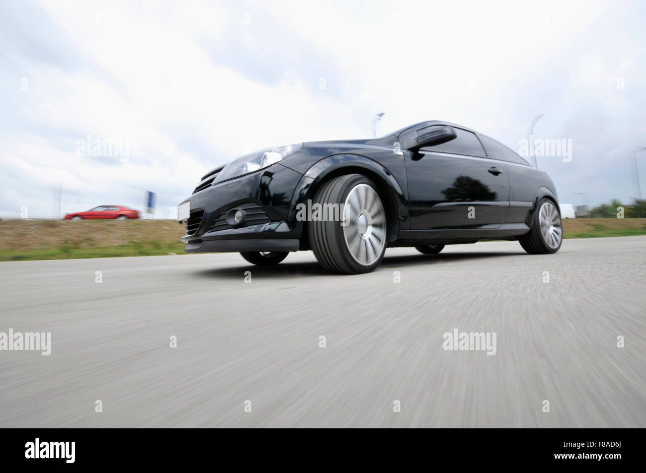 Fast car moving with motion blur Stock Photo - Alamy