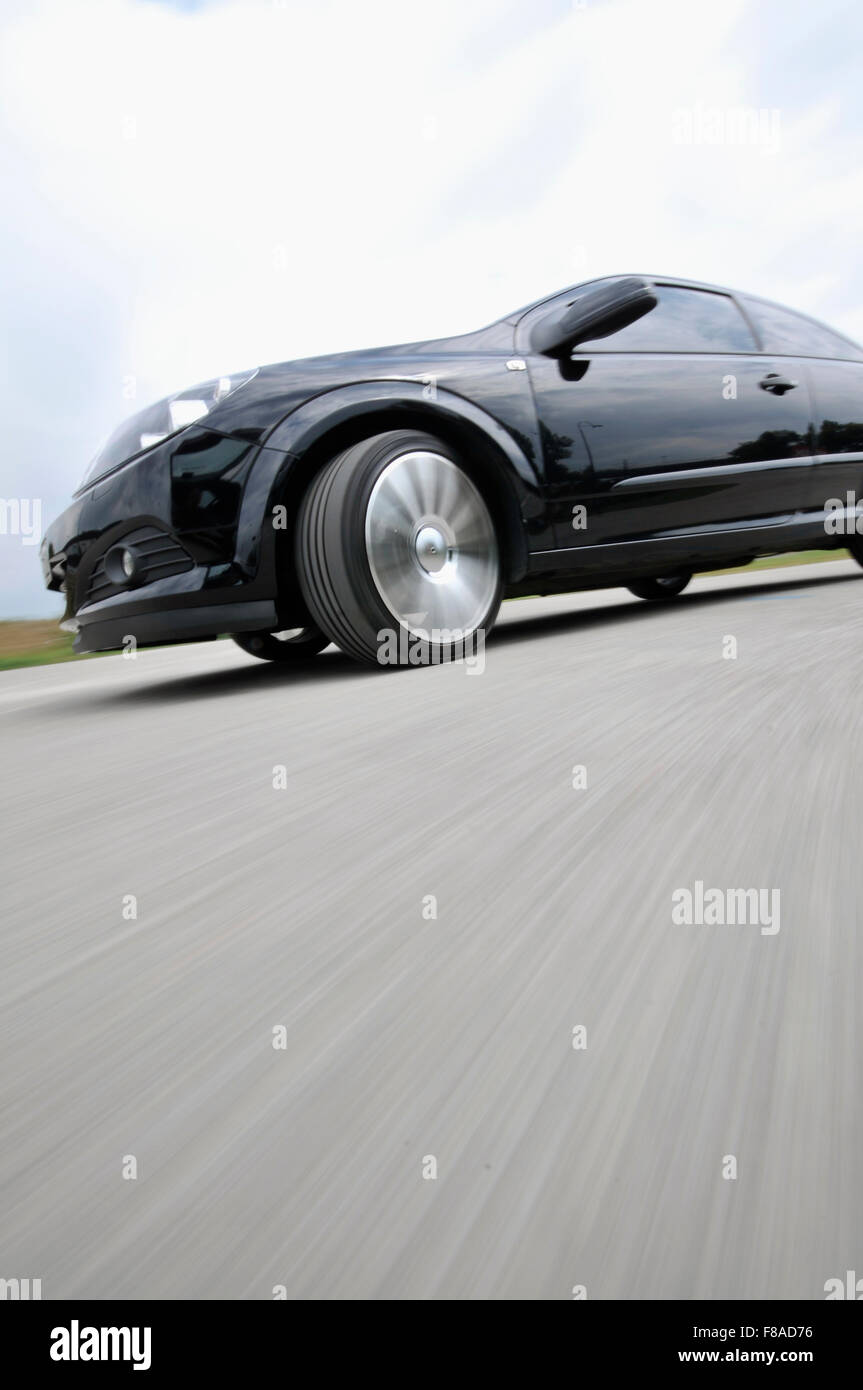 Fast car moving with motion blur Stock Photo - Alamy