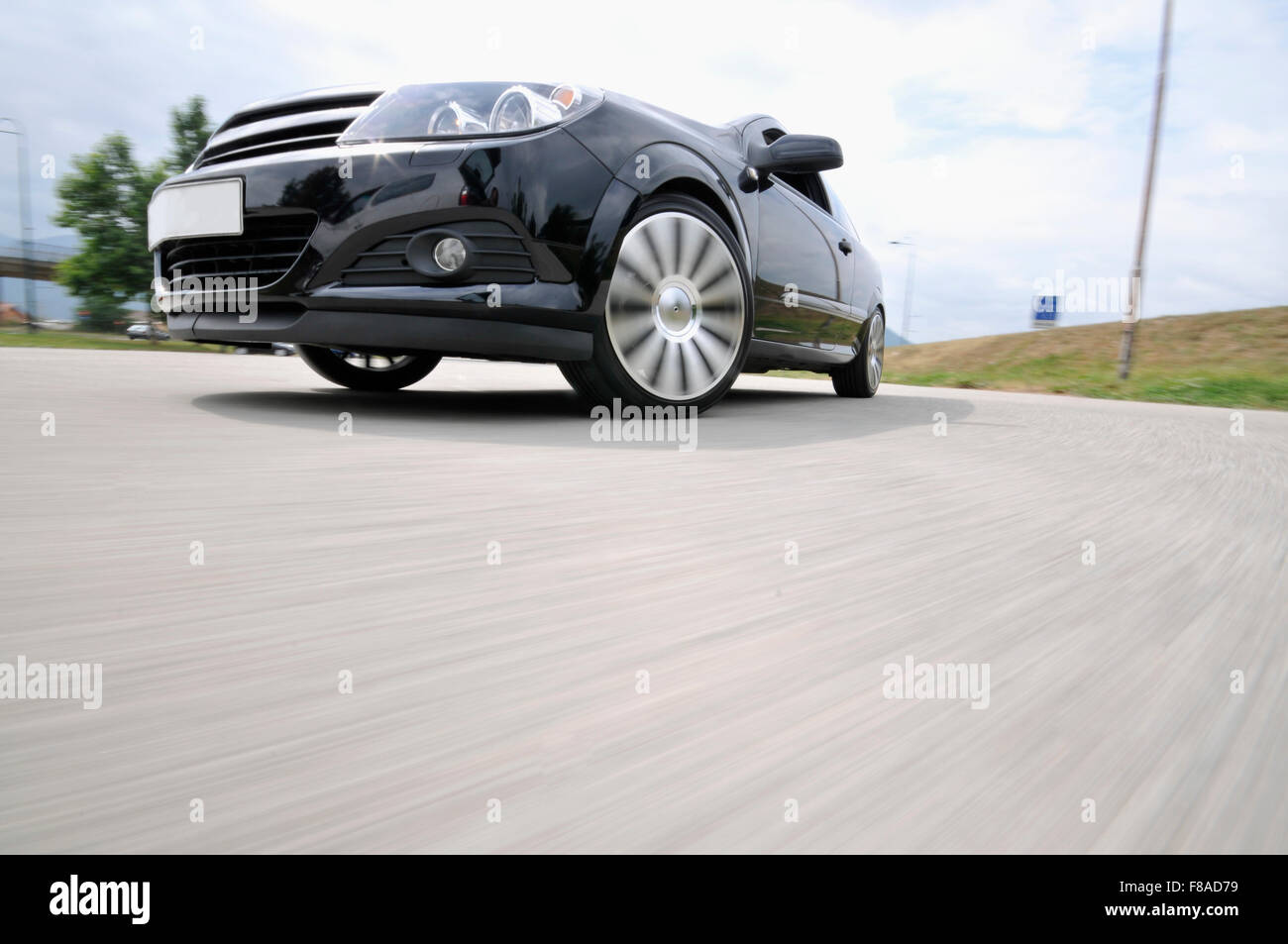 Fast car moving with motion blur Stock Photo - Alamy