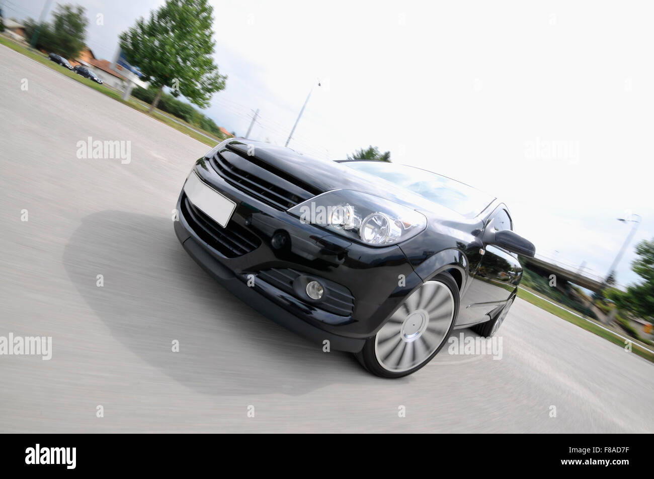 Fast car moving with motion blur Stock Photo - Alamy