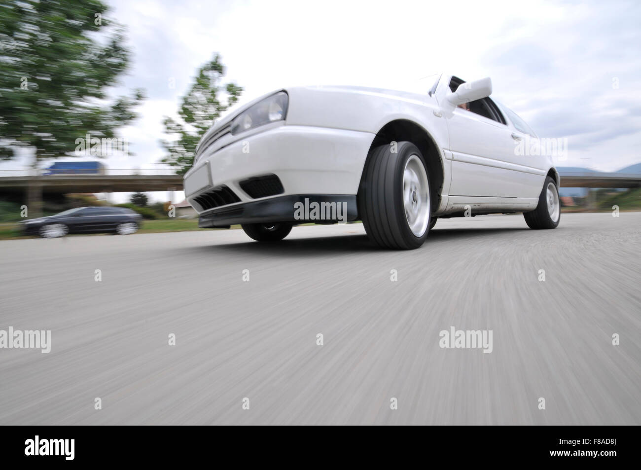 Fast car moving with motion blur Stock Photo - Alamy