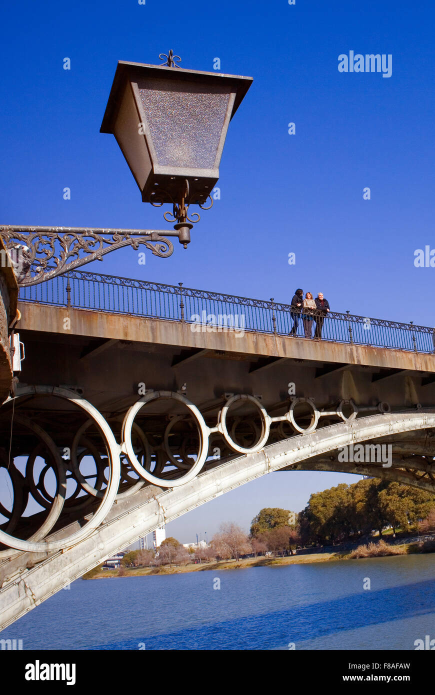 Isabel II bridge or Triana bridge. Guadalquivir river. Seville ...