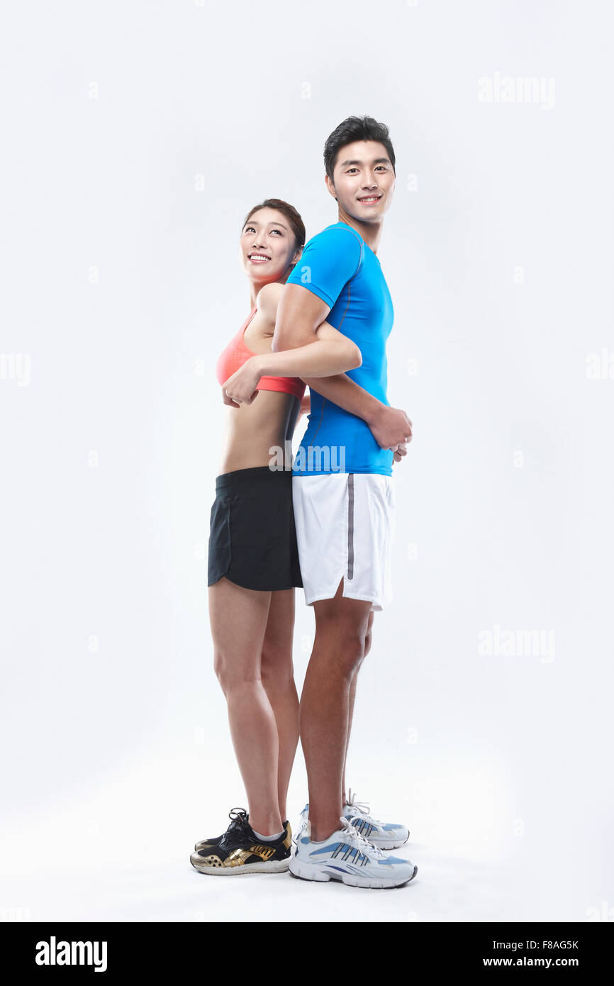 Two people backs to each other hi-res stock photography and images - Alamy