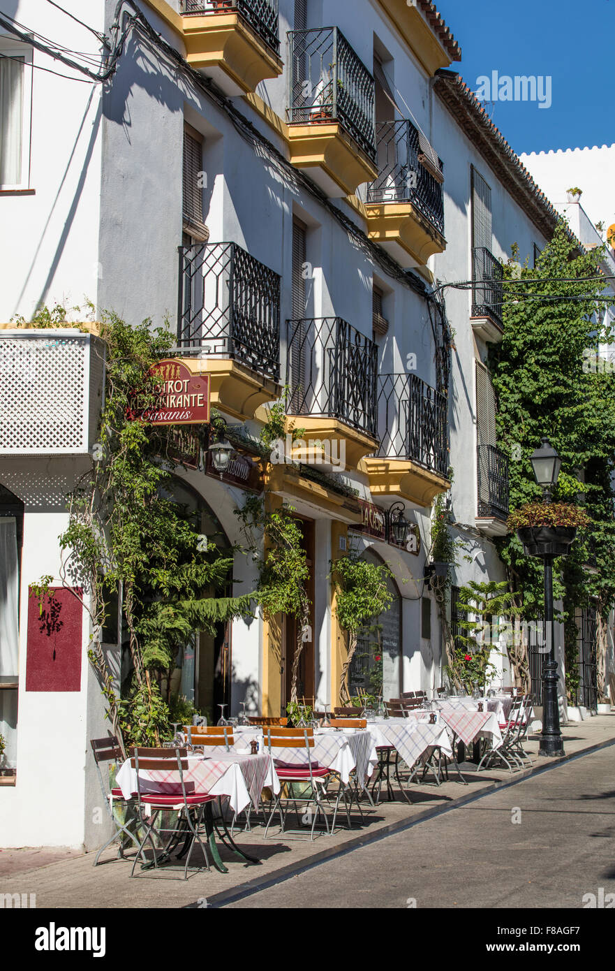 Outside a traditional Spanish restaurant in Old Marbella with tables ...