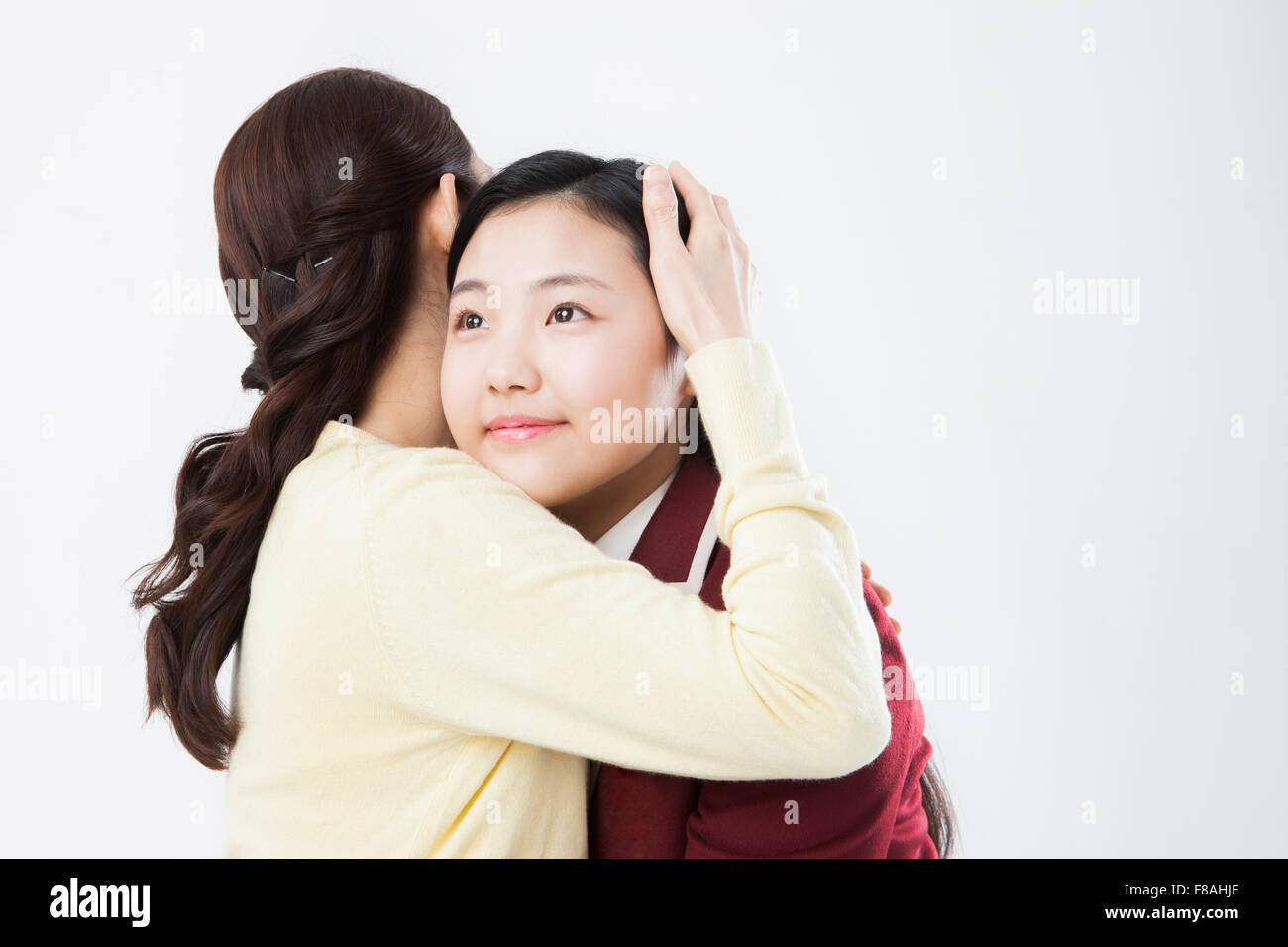 Mother hugging her daughter Stock Photo - Alamy Mother hugging her daughter Stock Photo - Alamy