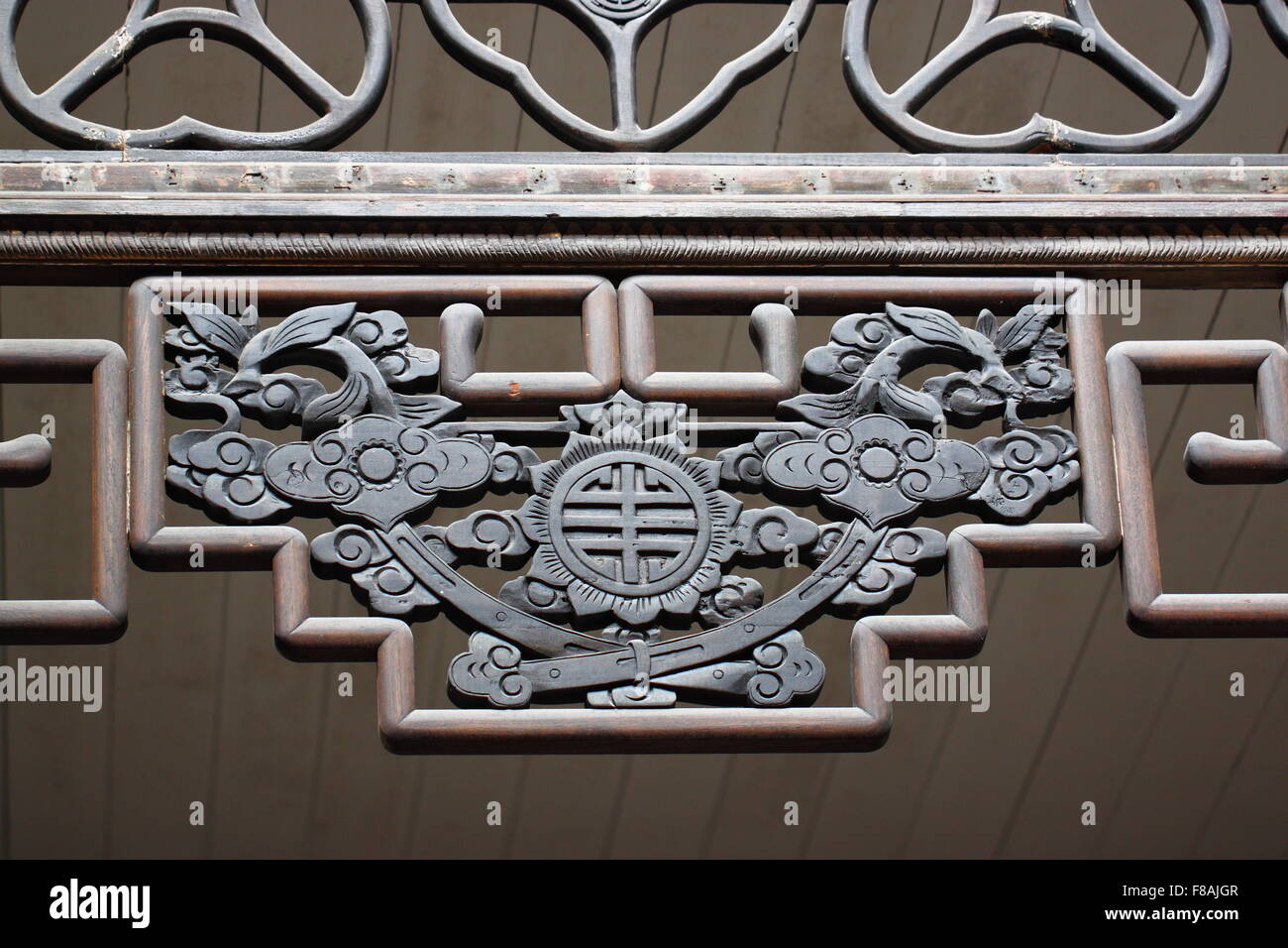Chinese wood window sculpture decoration Stock Photo - Alamy