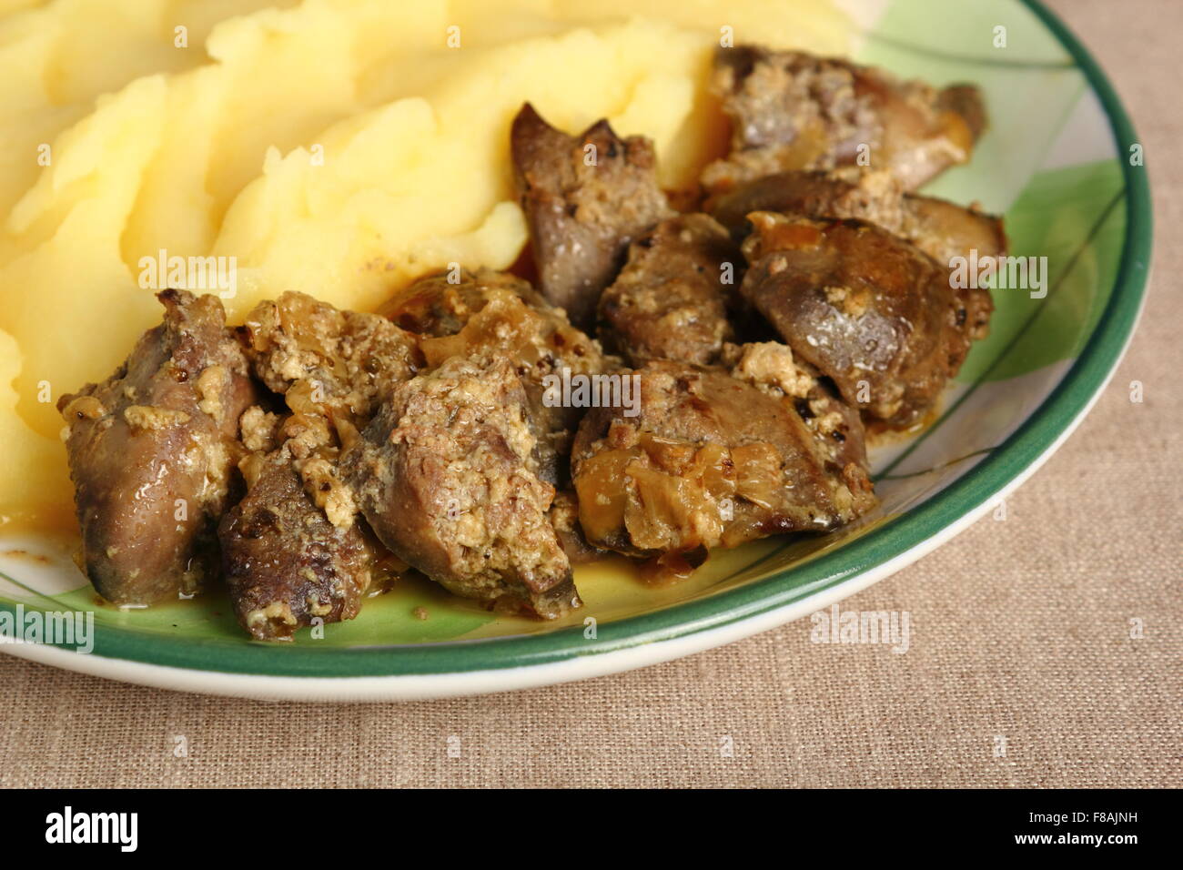 Fried chicken livers and mashed potatoes Stock Photo - Alamy