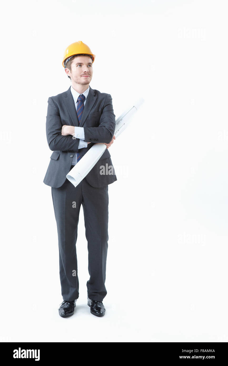 Man holding blueprint hi-res stock photography and images - Alamy