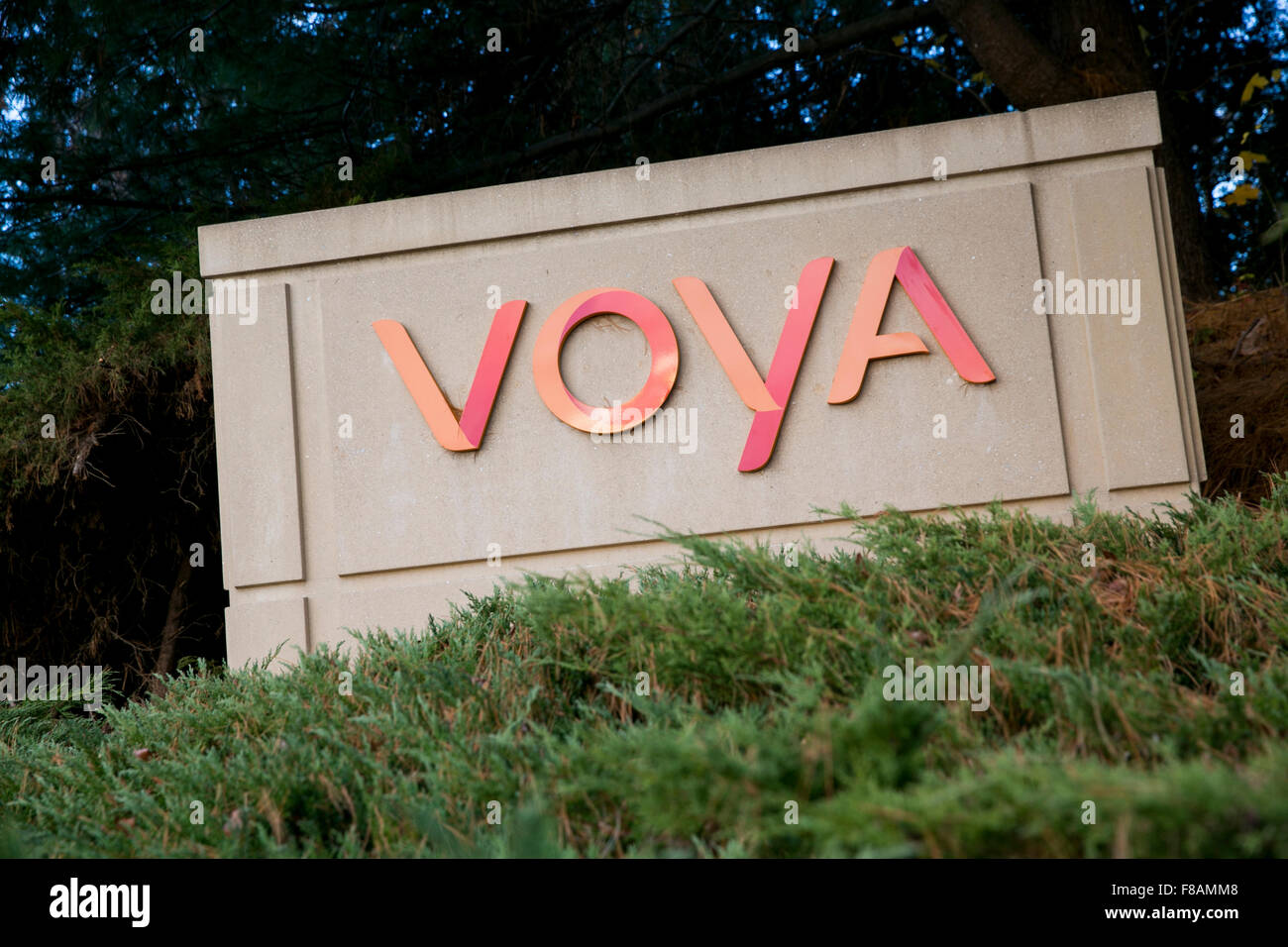 A logo sign outside of a facility occupied by Voya Financial in Windsor ...