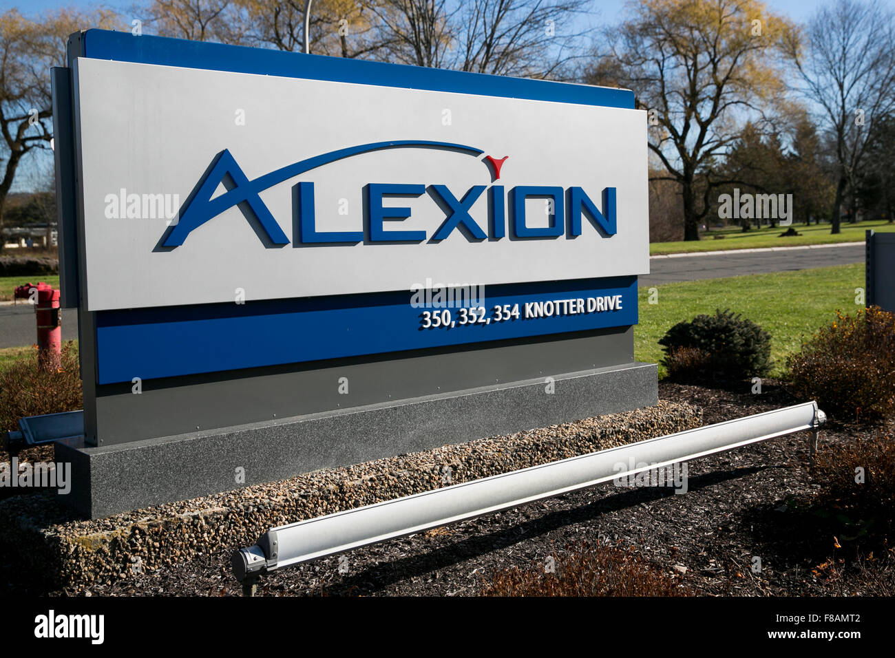 A logo sign outside of the headquarters of Alexion Pharmaceuticals Inc ...