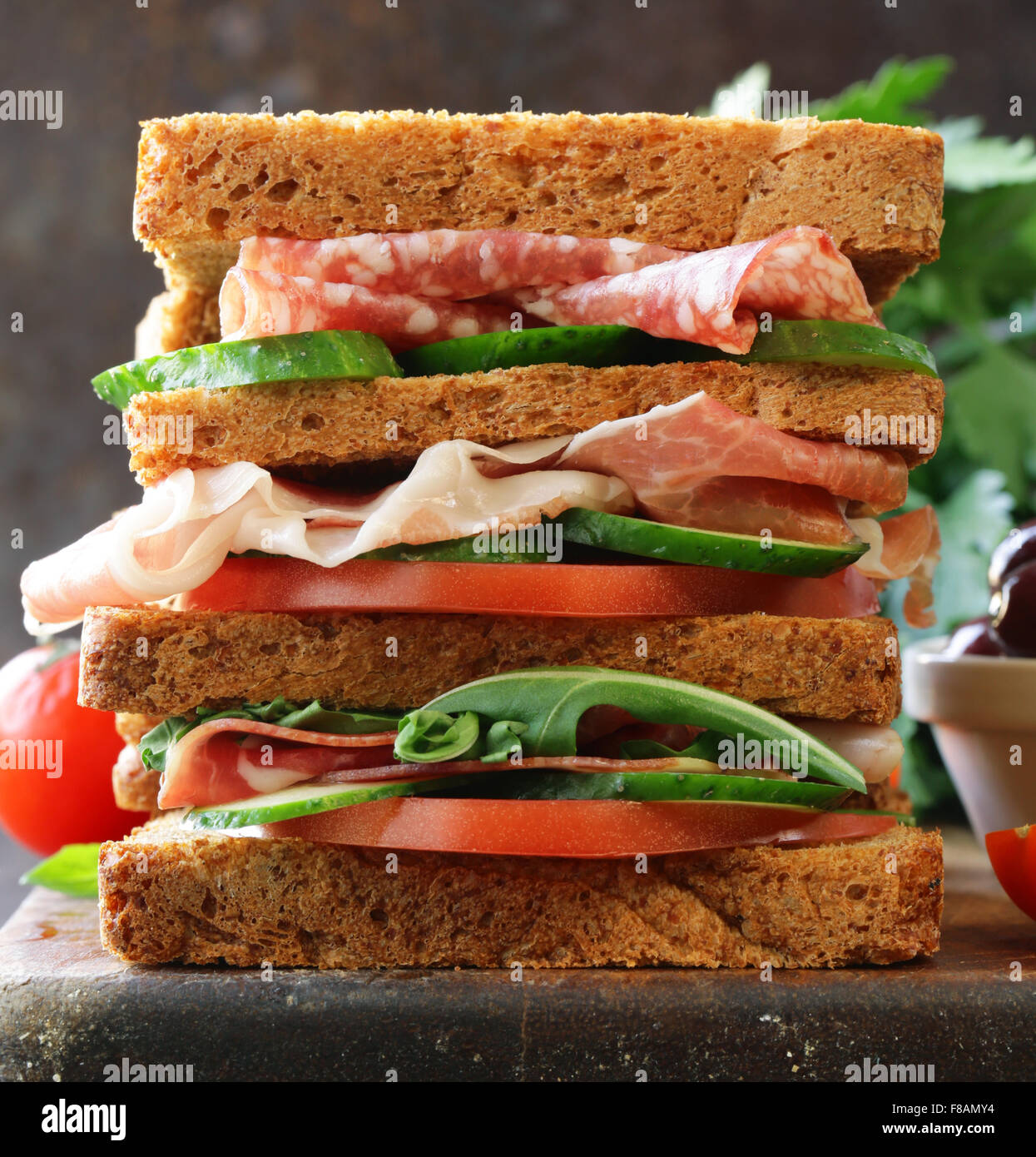 sandwich of rye bread with ham and vegetables Stock Photo - Alamy