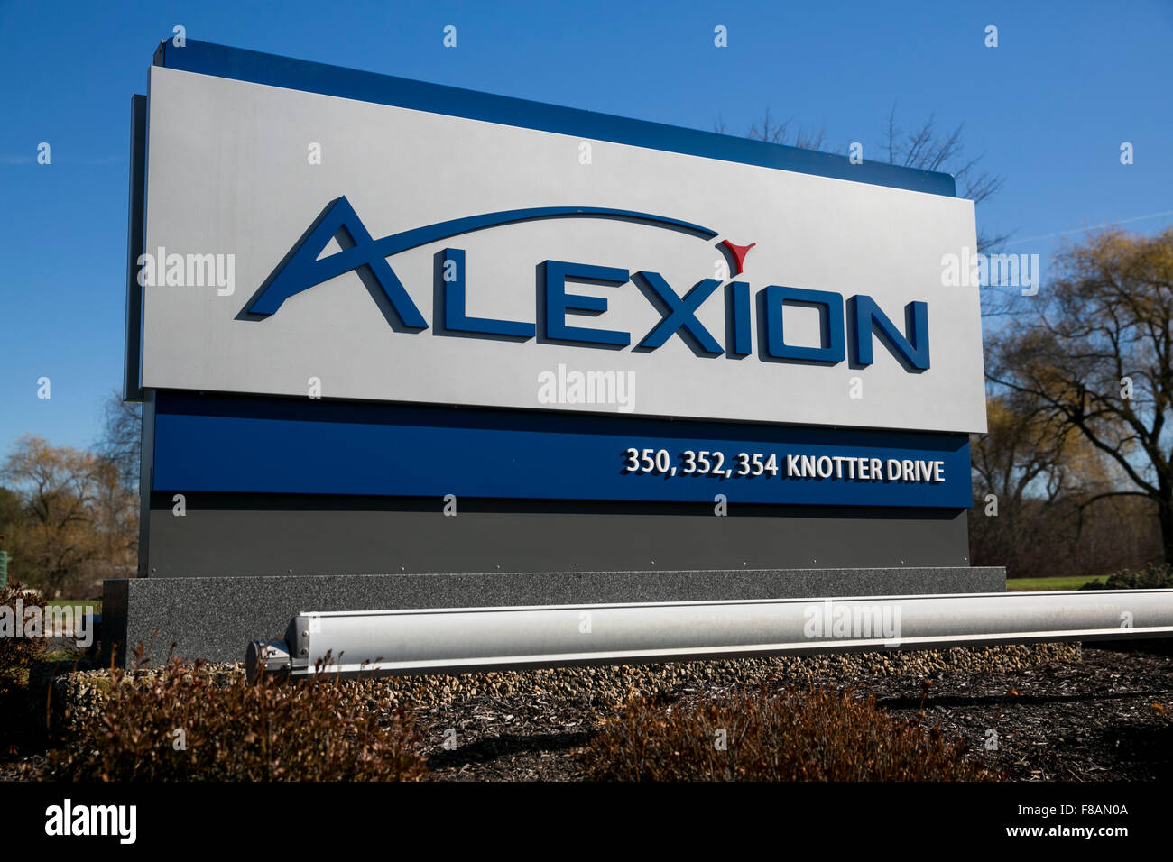 A logo sign outside of the headquarters of Alexion Pharmaceuticals Inc ...