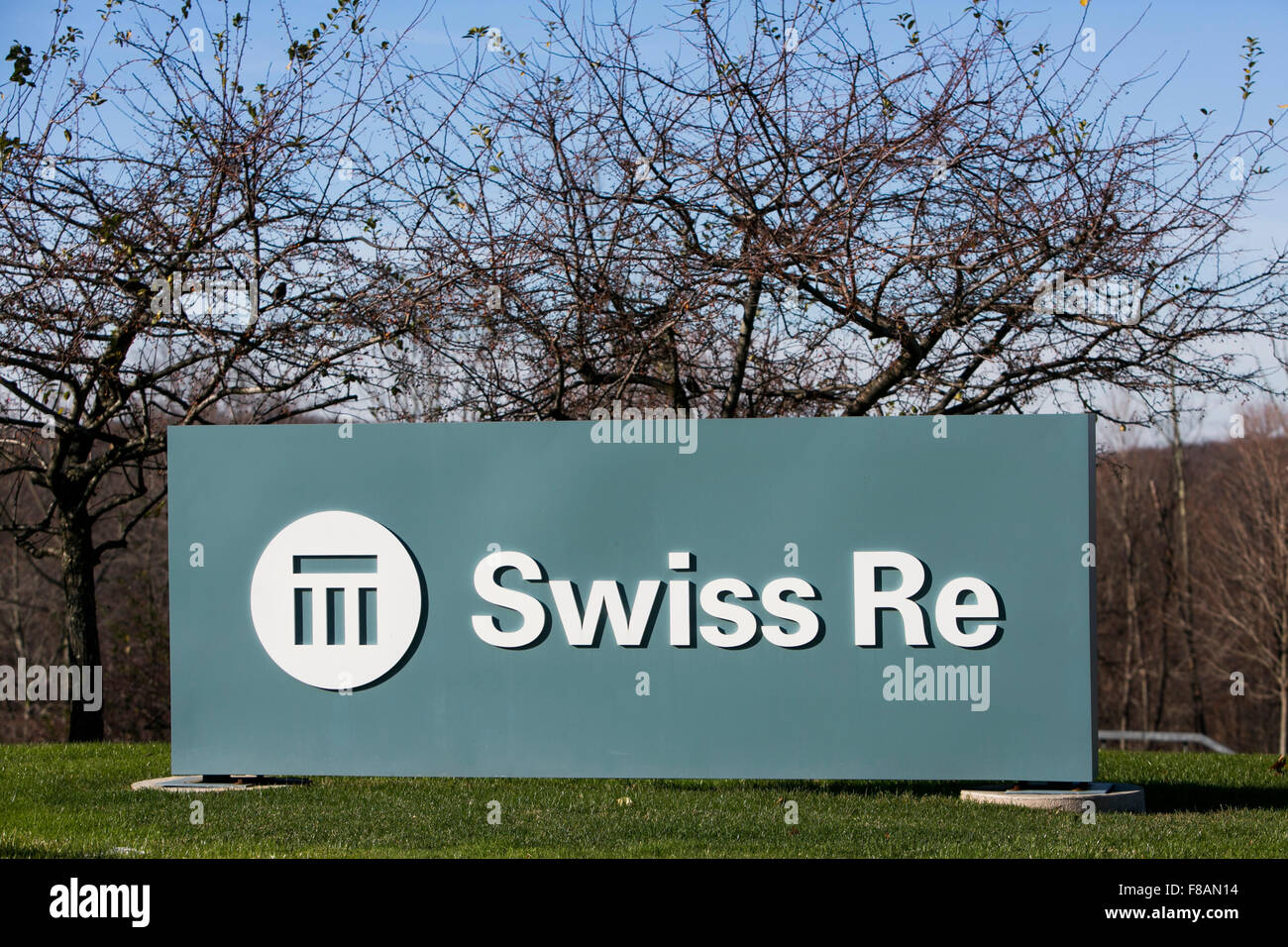 A logo sign outside of a facility occupied by Swiss Reinsurance Company ...