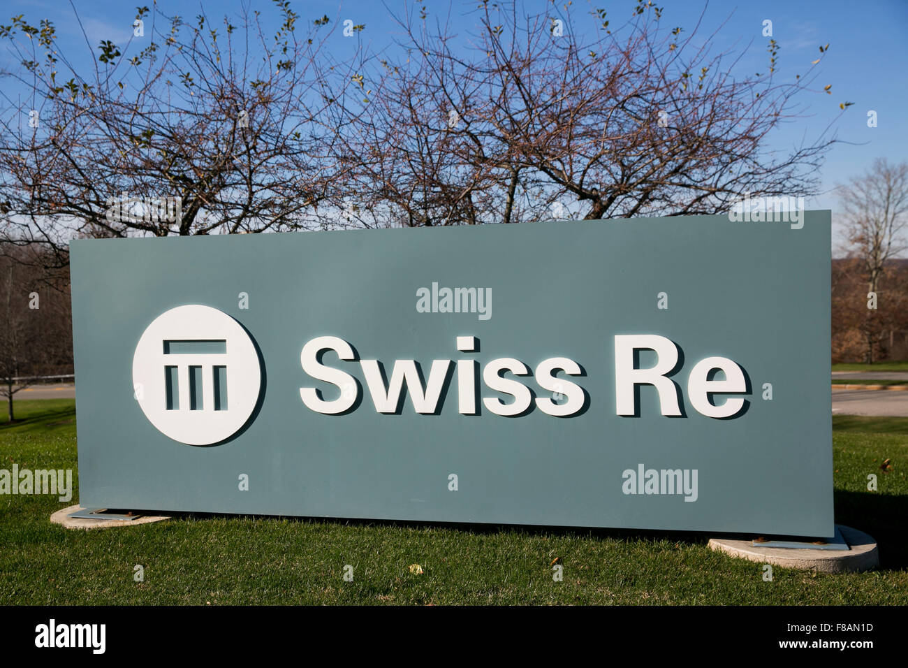 A logo sign outside of a facility occupied by Swiss Reinsurance Company ...