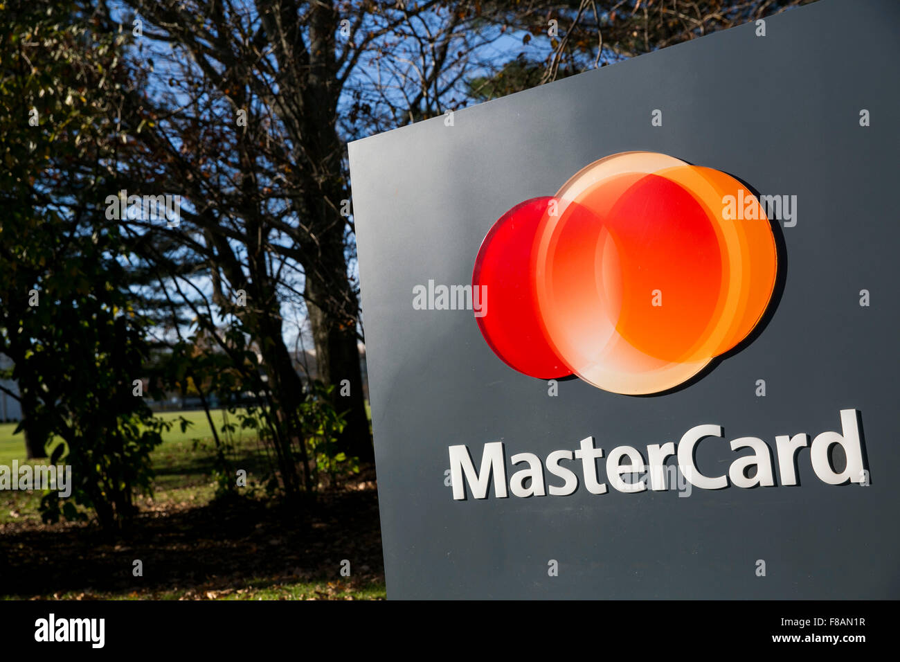 A logo sign outside of the headquarters of MasterCard Worldwide in ...