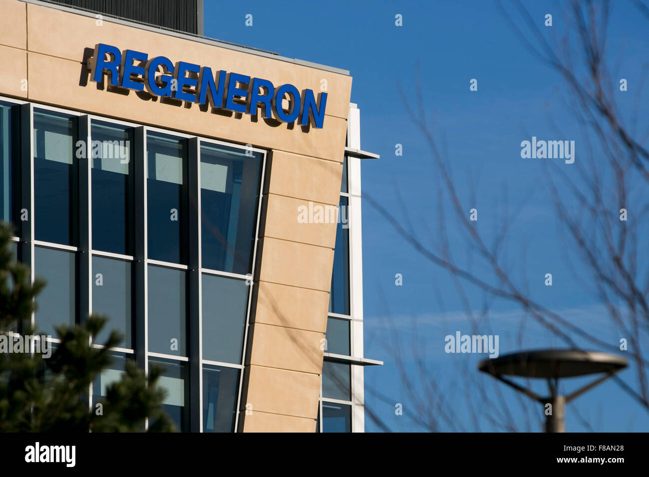 A logo sign outside of the headquarters of Regeneron Pharmaceuticals ...