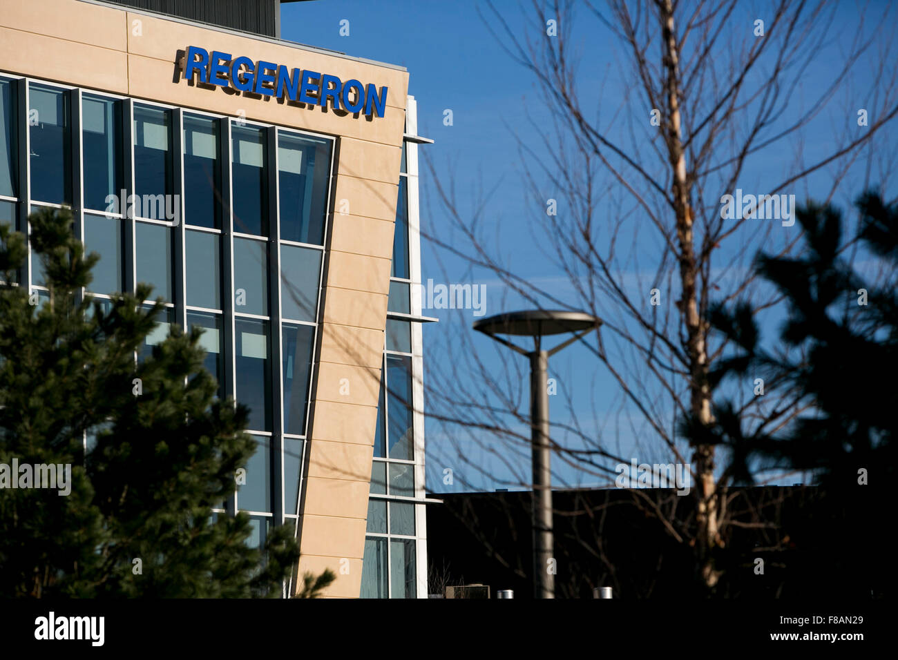 A logo sign outside of the headquarters of Regeneron Pharmaceuticals ...