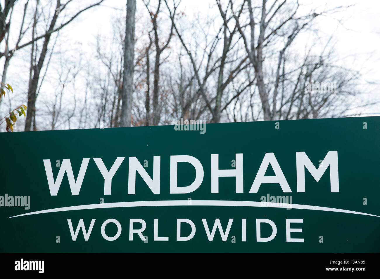 A logo sign outside of the headquarters of the hotel operator Wyndham ...