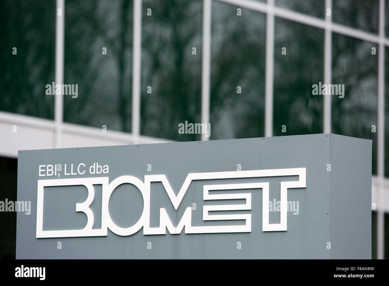 A logo sign outside of a facility occupied by Zimmer Biomet in ...