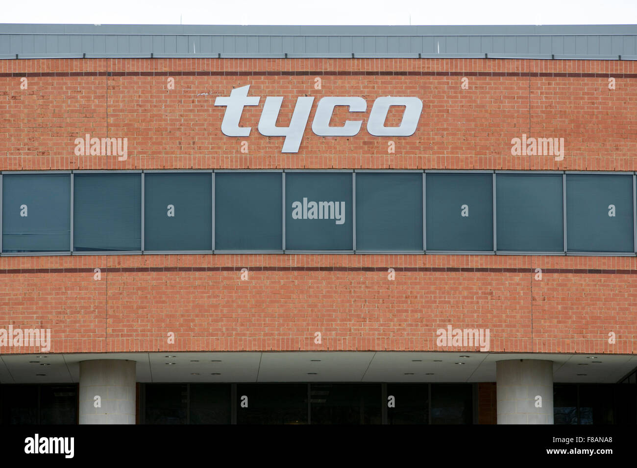 A logo sign outside of the headquarters of Tyco International Ltd., in ...