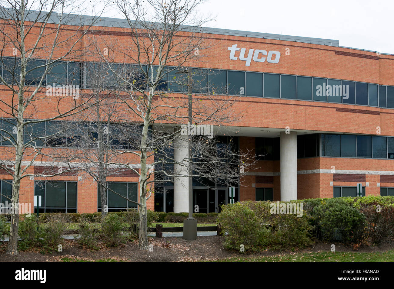A logo sign outside of the headquarters of Tyco International Ltd., in ...
