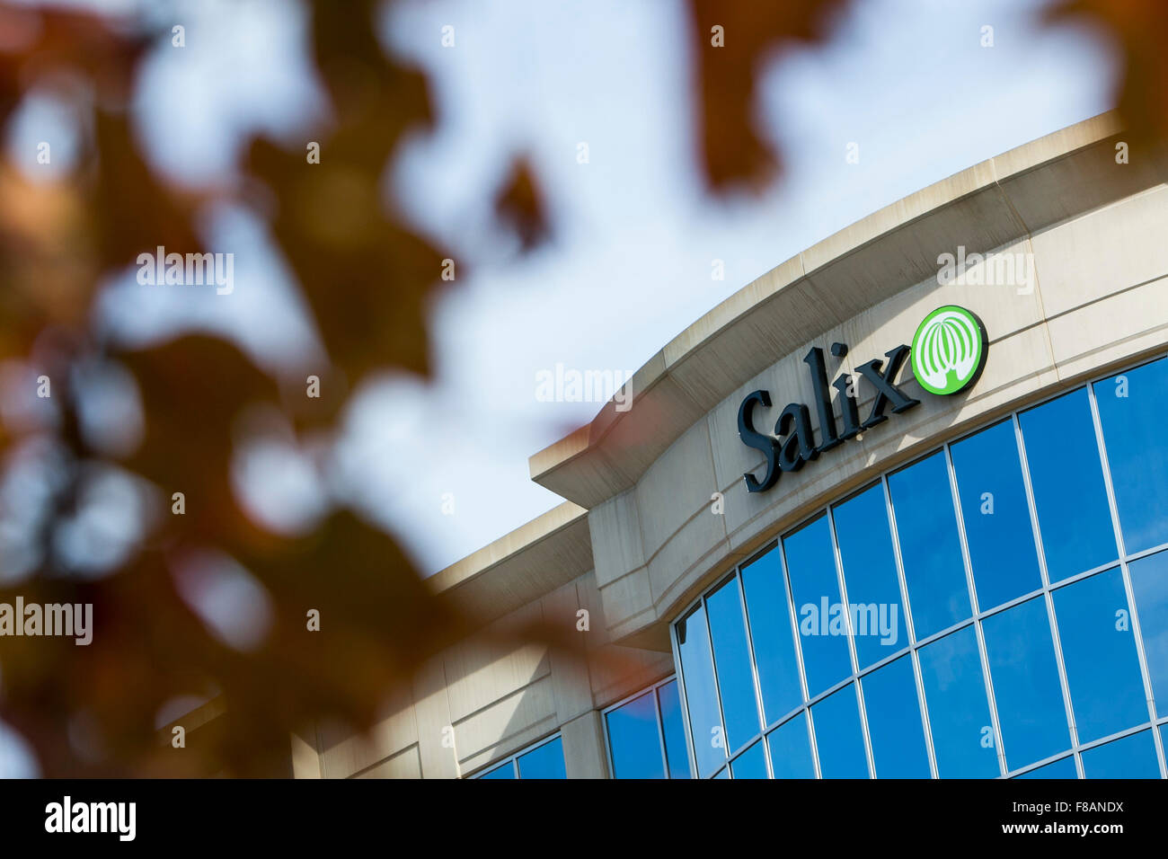 A logo sign outside of the headquarters of Salix Pharmaceuticals, Inc ...