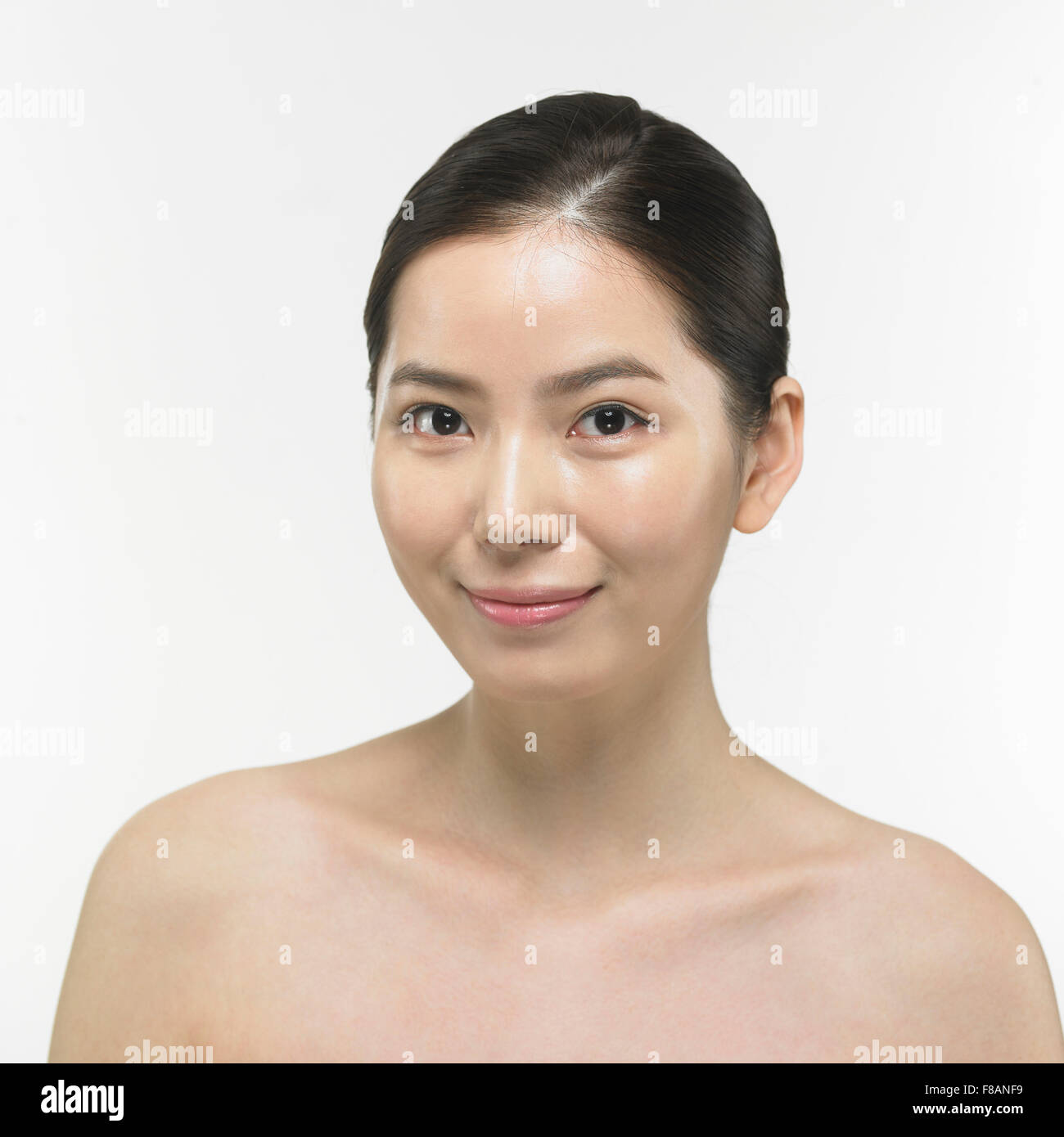 Portrait of Korean woman staring at front with a smile Stock Photo - Alamy