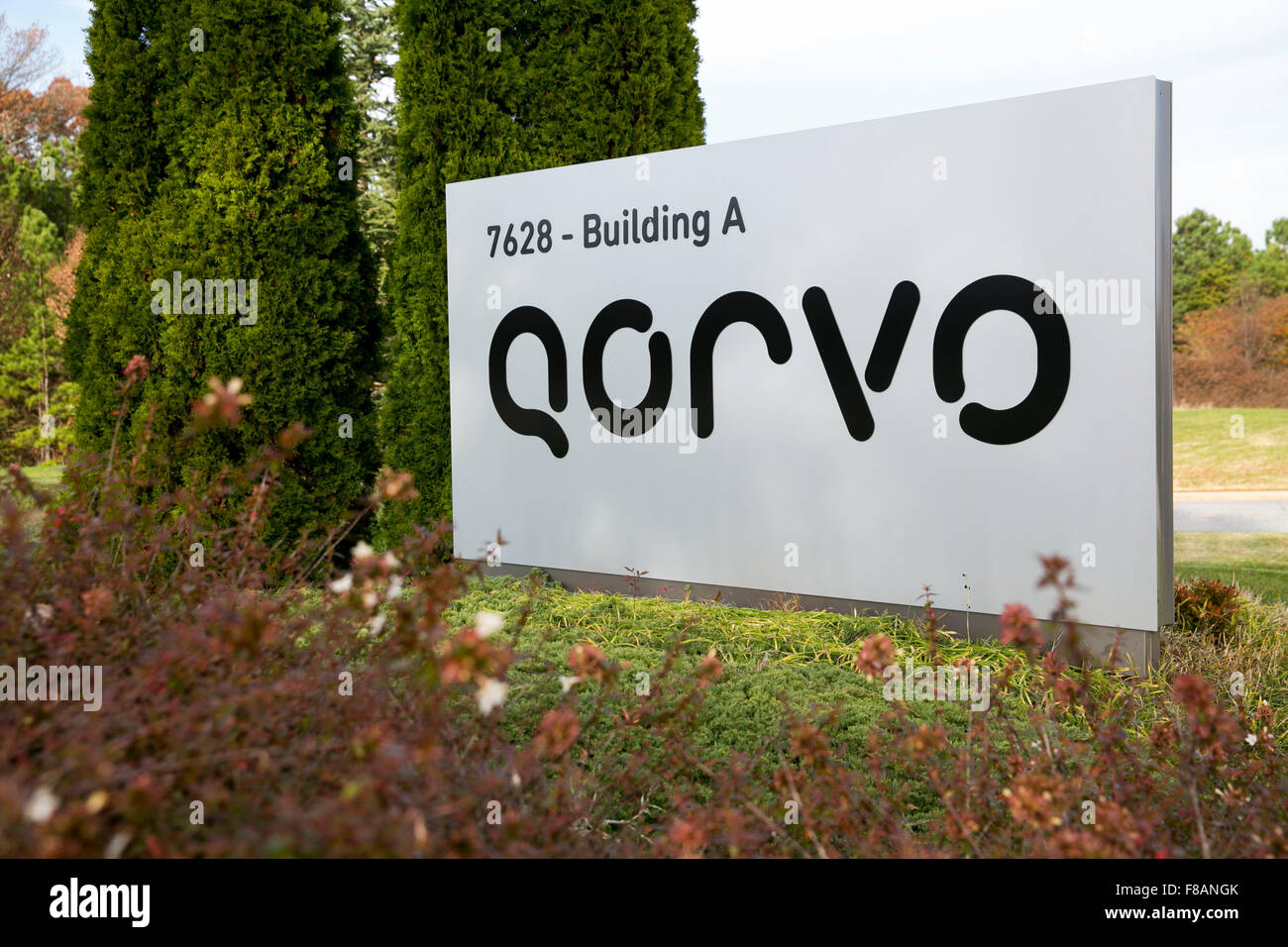 A logo sign outside of the headquarters of Qorvo in Greensboro, North ...