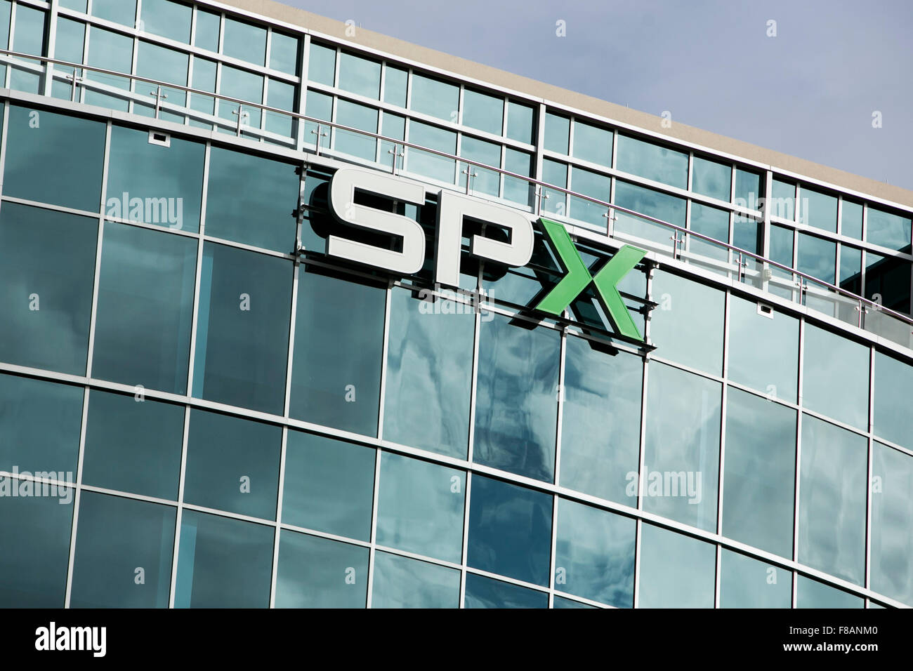 A logo sign outside of the headquarters of the SPX Corporation in ...