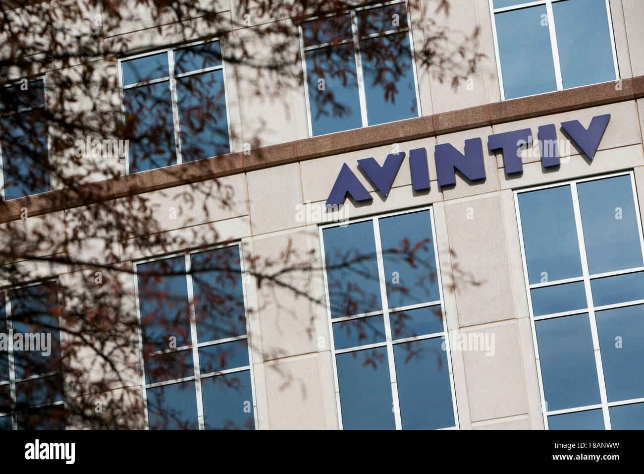 A logo sign outside of the headquarters of Avintiv in Charlotte, North ...