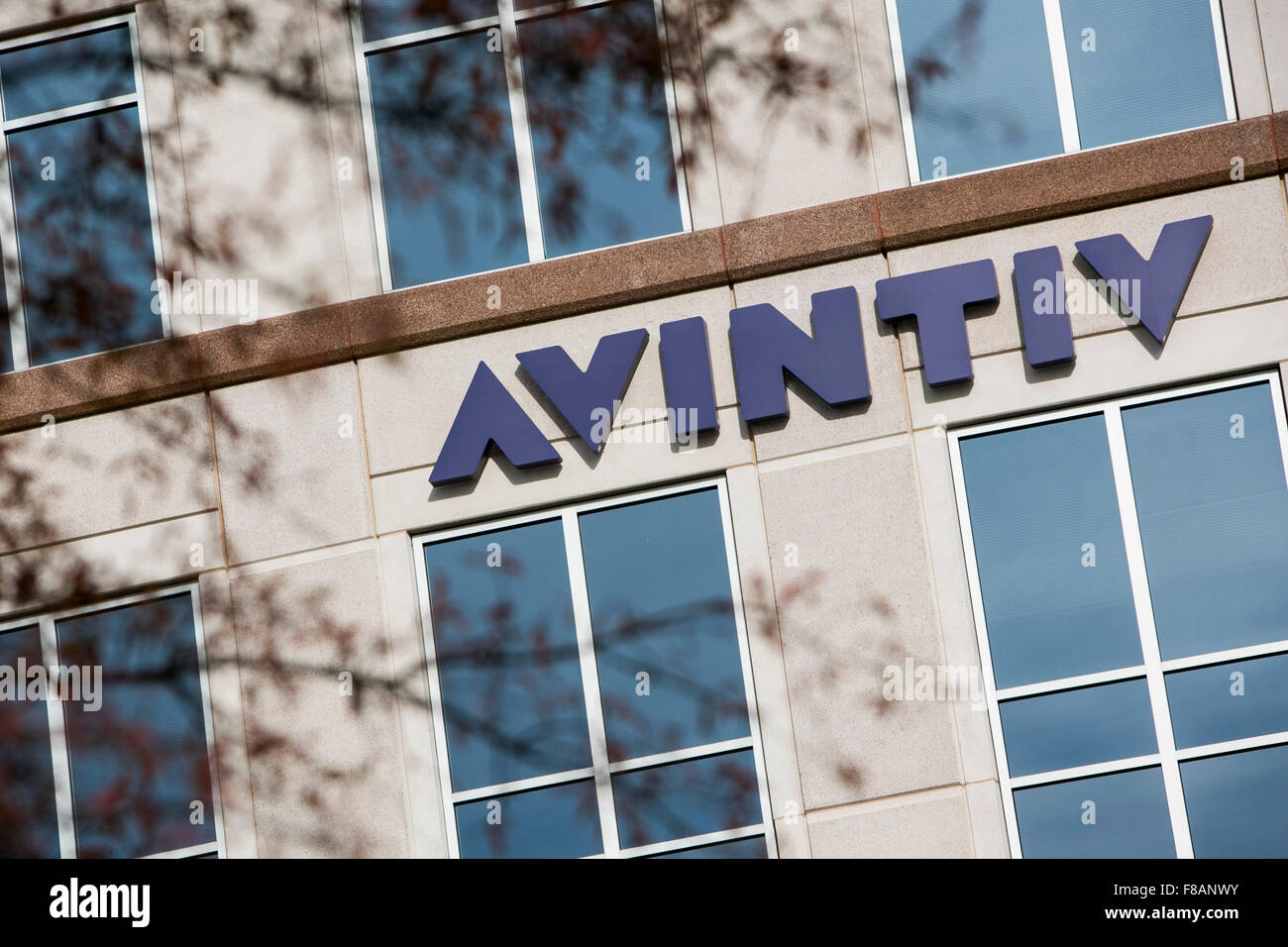 A logo sign outside of the headquarters of Avintiv in Charlotte, North ...